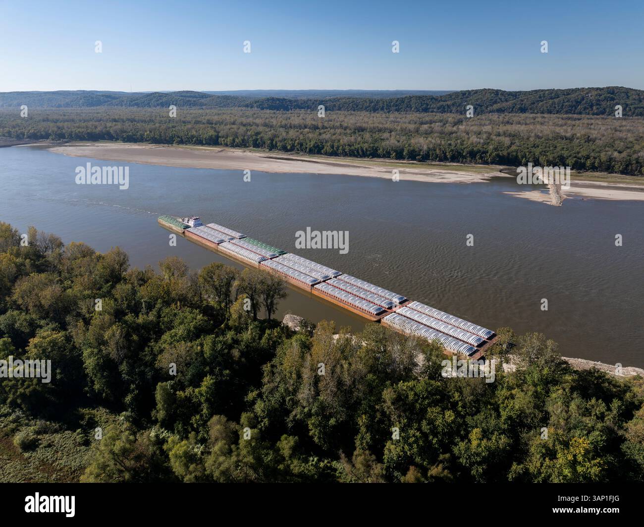 Aerial view of the tranquil Mississippi River surrounded by lush ...