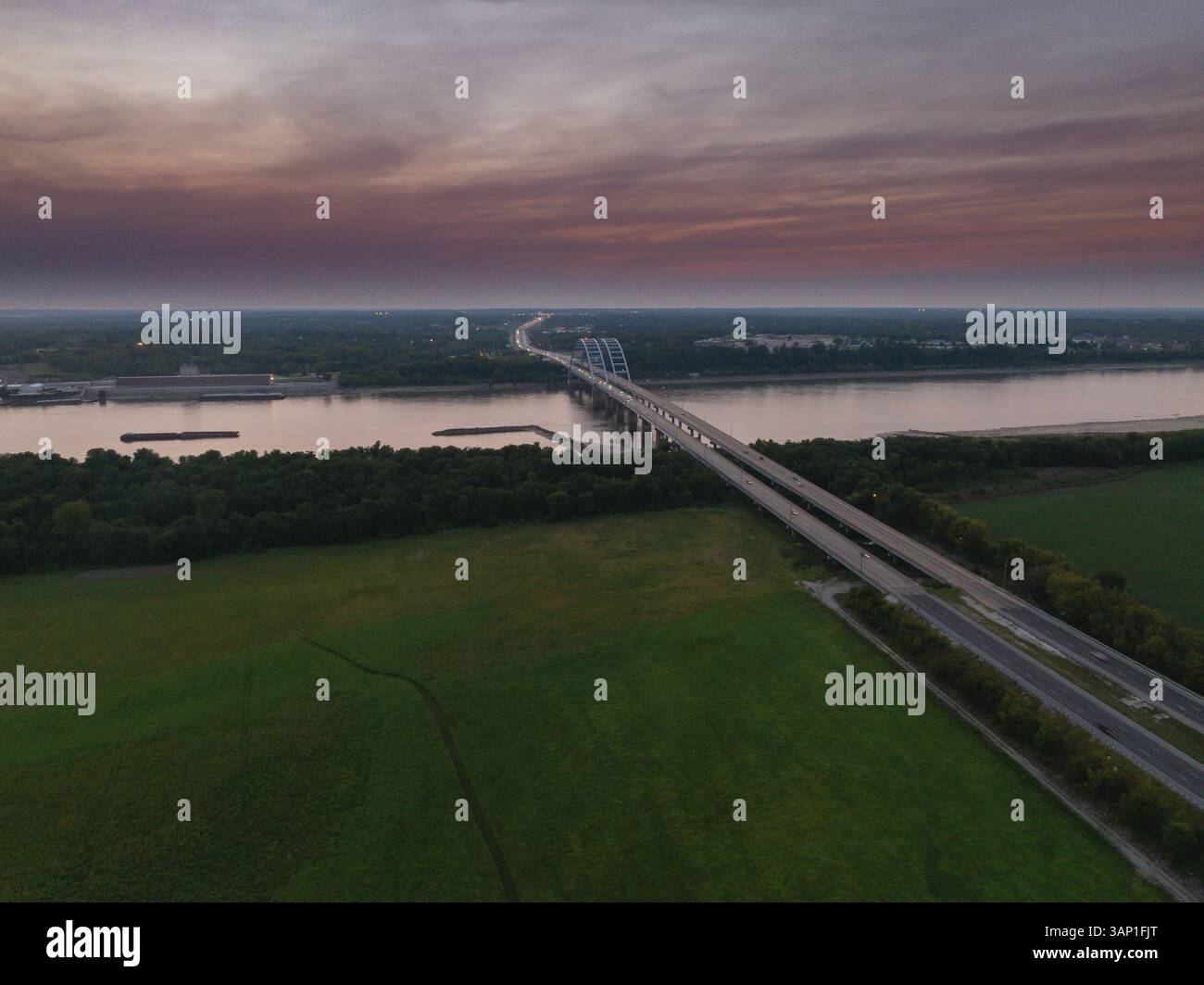 Aerial view of a beautiful sunset over the Mississippi River with a ...