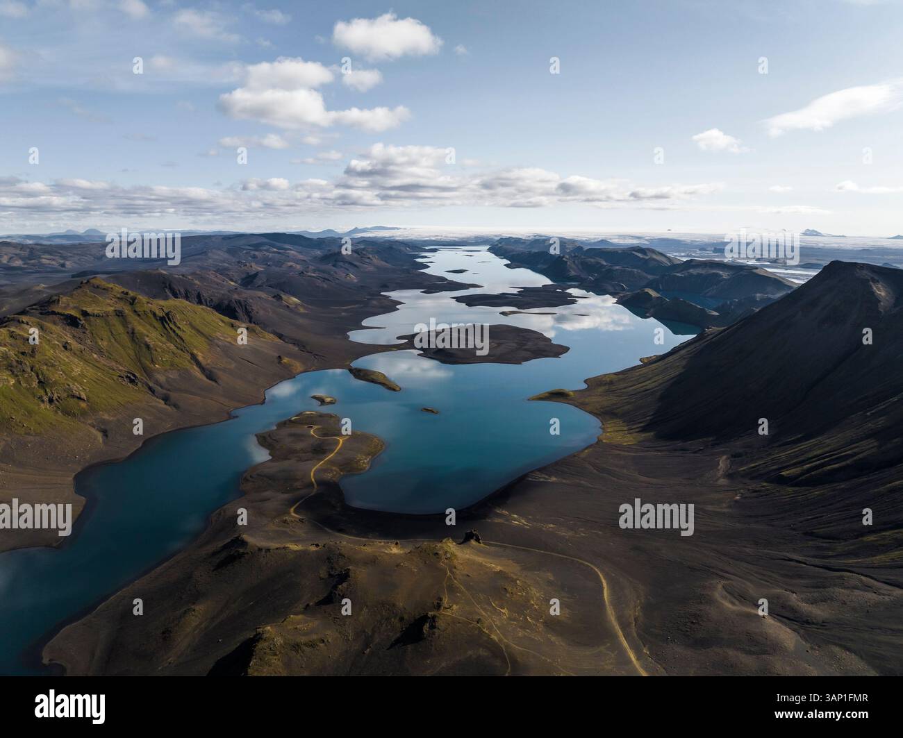 Aerial view of Langisfor lake at sunset, a scenic lake surrounded by ...