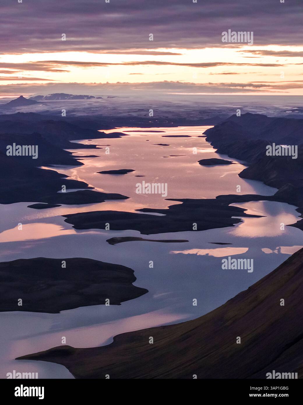 Aerial view of Langisfor lake at sunset, a scenic lake surrounded by ...