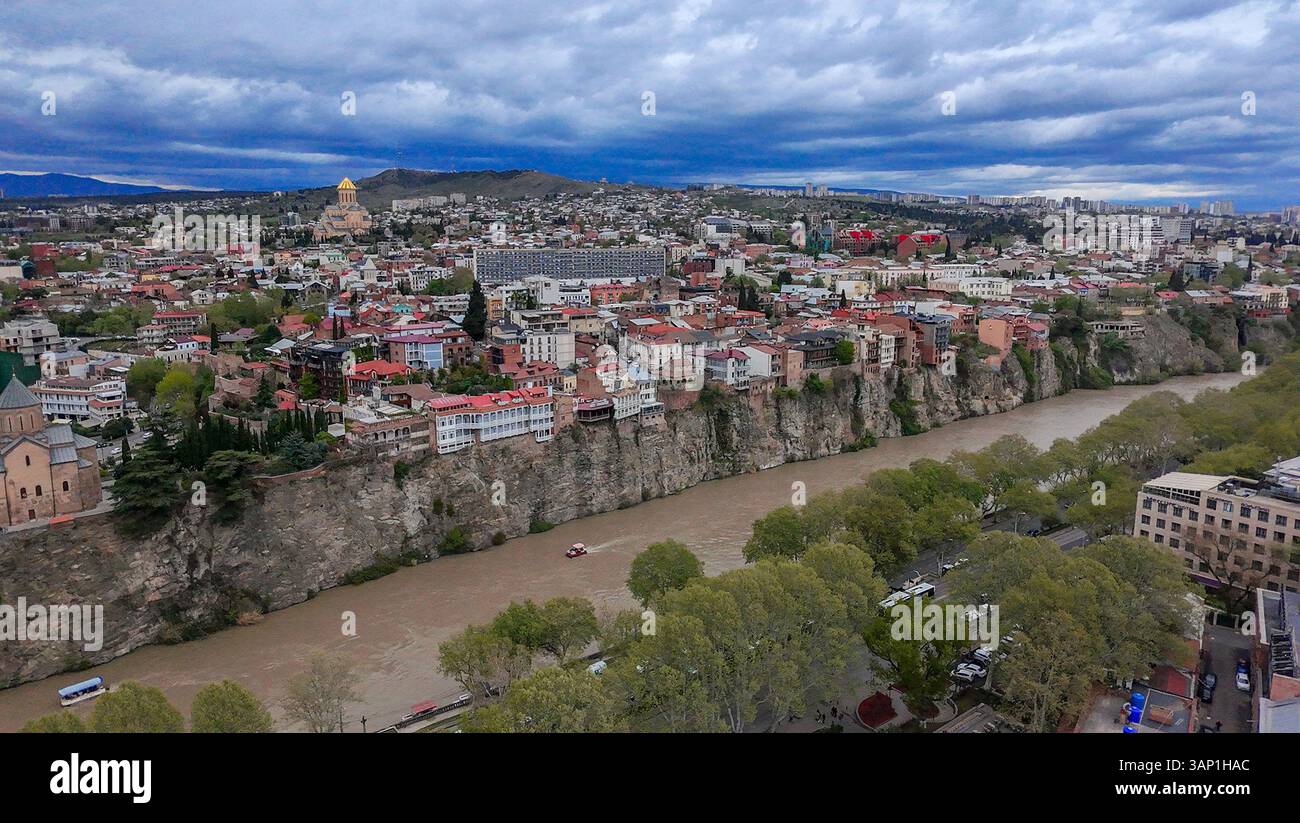 Drone point of view on Kura river and panorama of Tbilisi by Metekhi ...