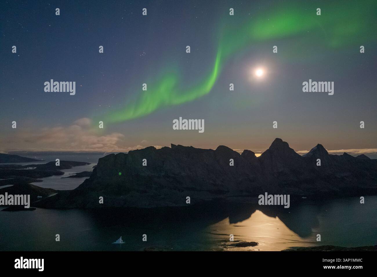 Aerial view of the northern lights over the fjords at night in ...