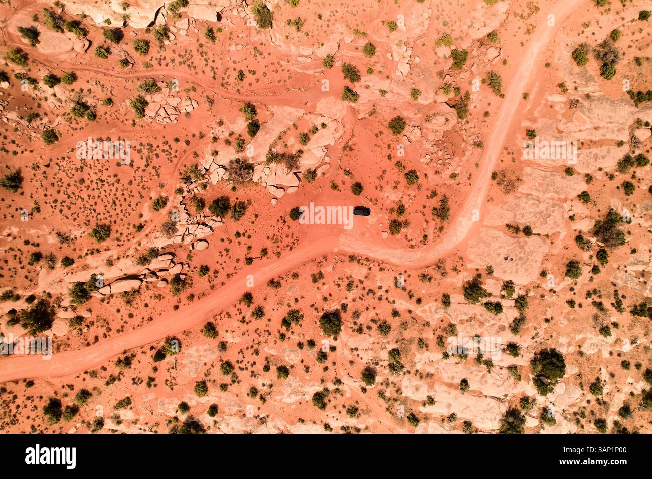 Aerial top down view of a trail crossing the Arches National Park in ...