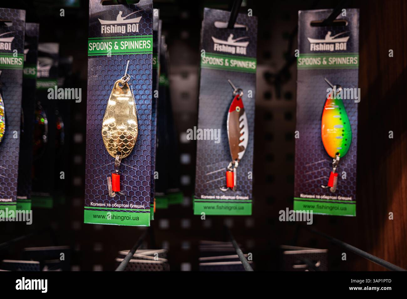 Kyiv, Ukraine - April 14, 2025: A selection of fishing spoons and ...