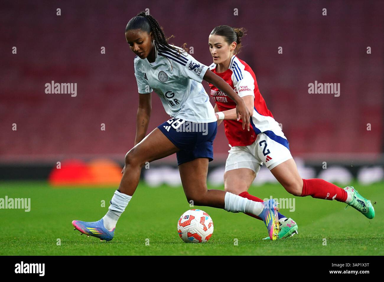 Leicester City's Shana Chossenotte (left) and Arsenal's Emily Fox ...