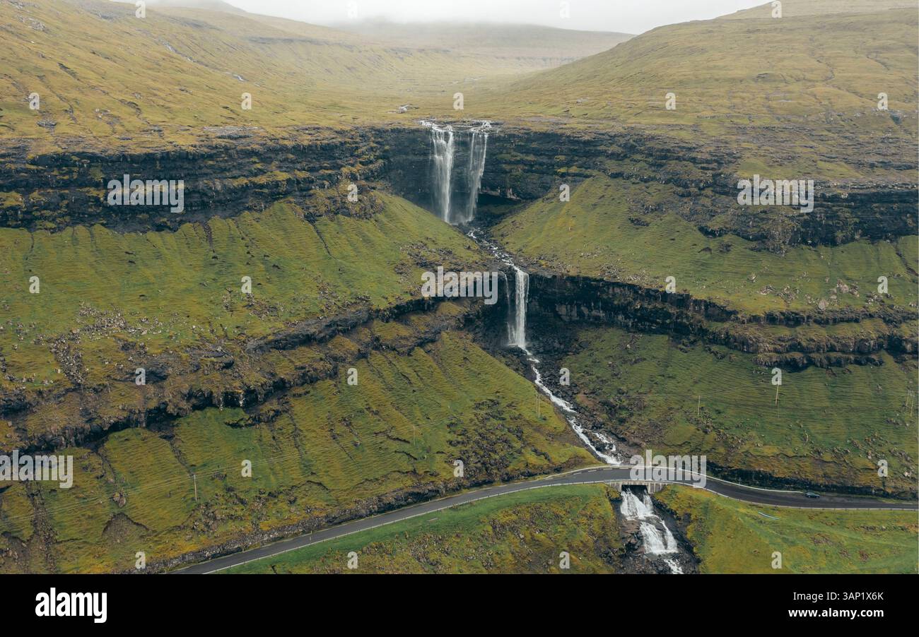 Aerial view of the majestic Fossa waterfall cascading through a ...