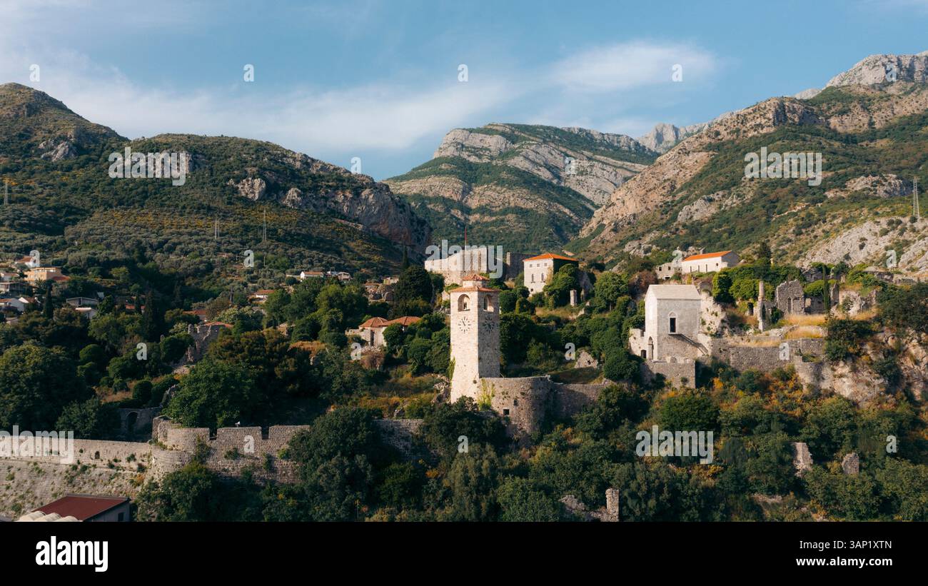 Aerial view of old town with medieval stone buildings and a tower ...