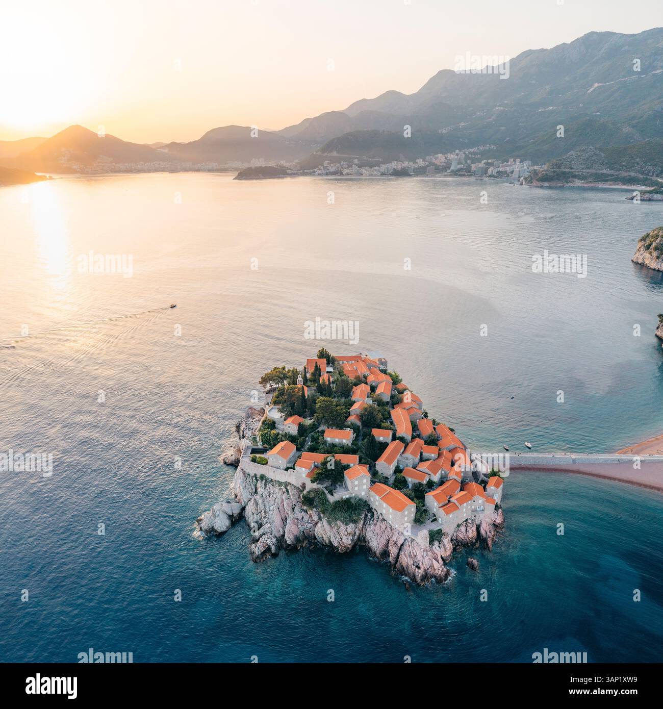 Aerial view of the beautiful island resort of Sveti Stefan with scenic ...