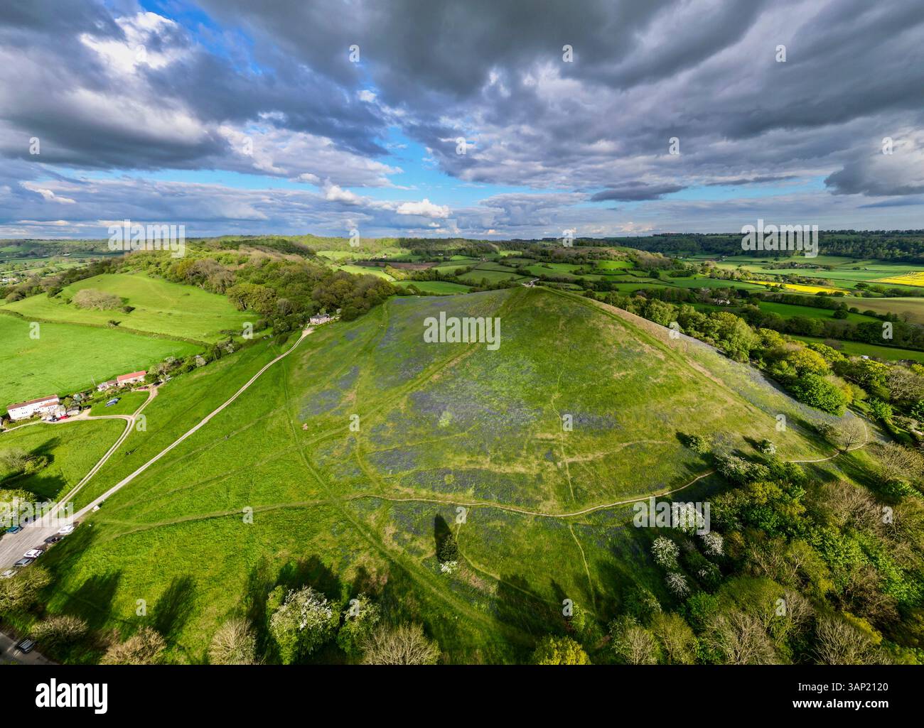 Aerial view of lush greenery and rolling hills in Cam Peak, Dursley ...