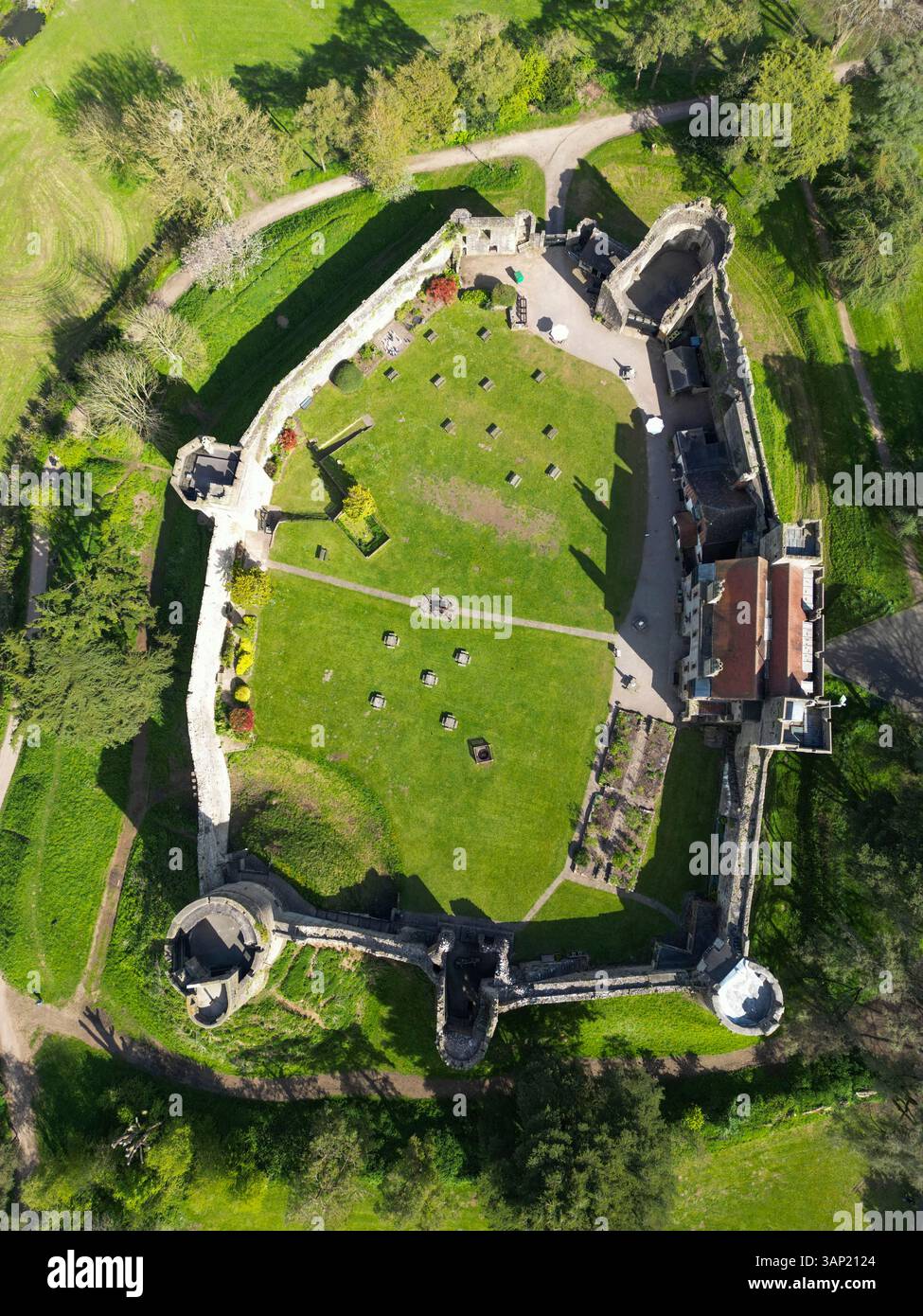 Aerial view of historic Caldicot Castle with greenery and ancient walls ...