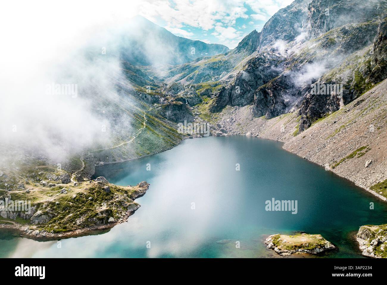 Aerial view of the Lac du Crozet with fog, lake nestled between ...