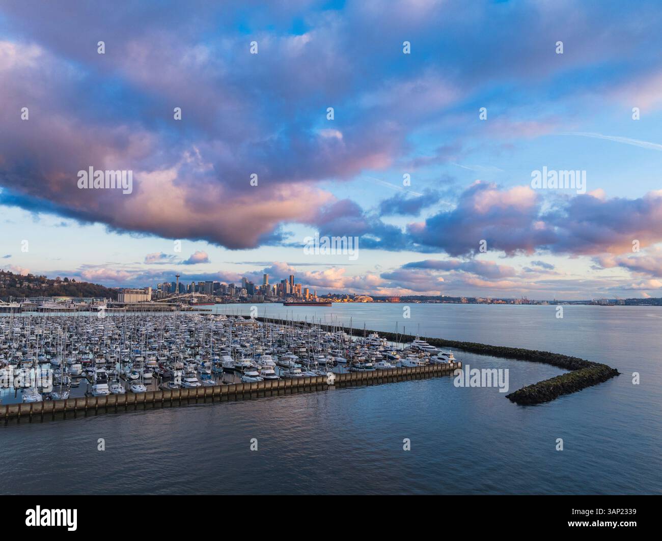 Aerial view of Smith Cove Marina with sailboats and a serene skyline at ...