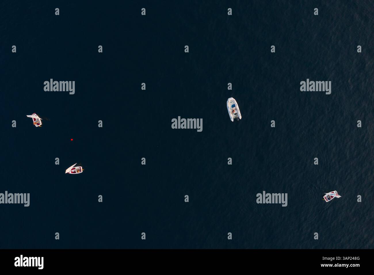 Aerial view of sailboats on tranquil waters of the Salish Sea, Seattle ...
