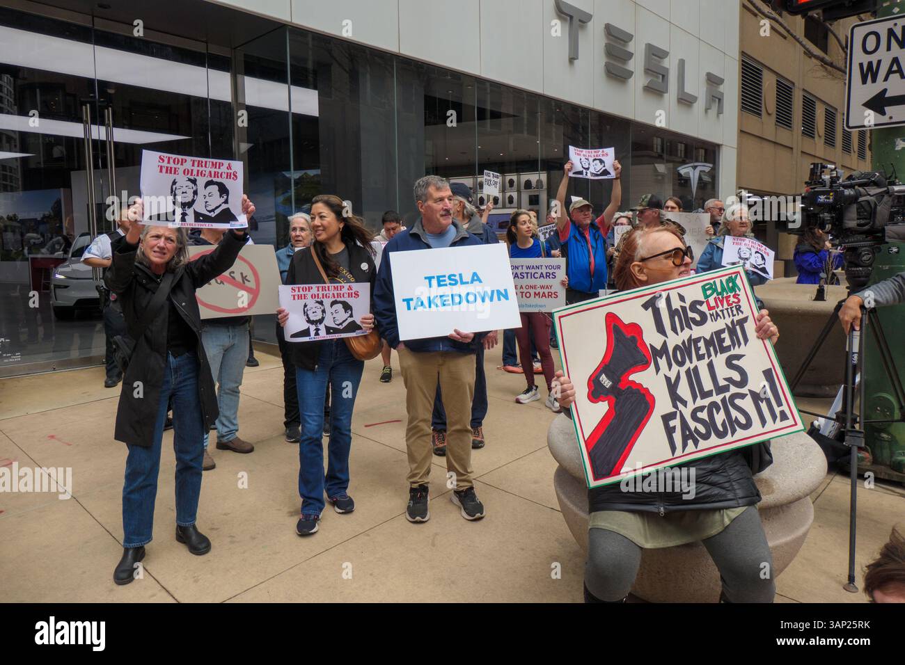 Tesla Takedown protest at Gold Coast Tesla showroom, Chicago, Illinois ...