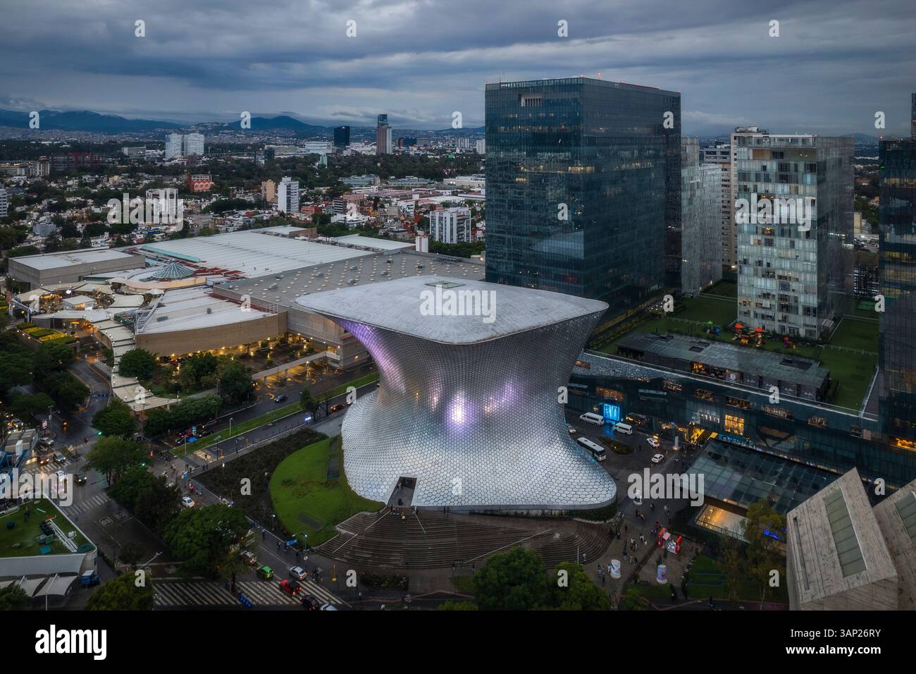 Aerial view of the modern Soumaya Museum surrounded by skyscrapers in ...