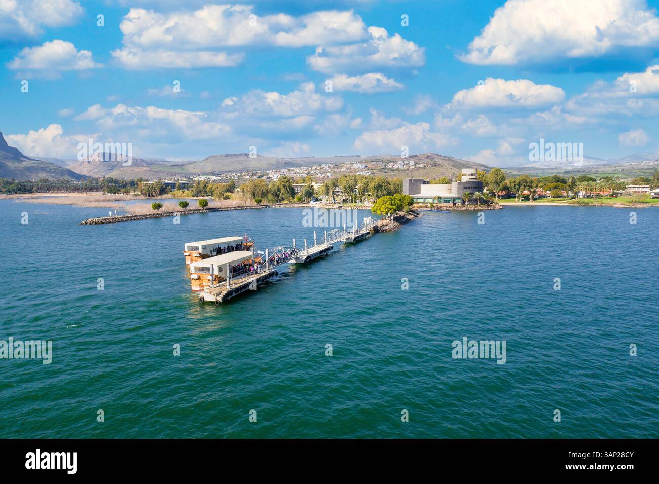Aerial view of passengers boats docked at the pier along the Jordan ...