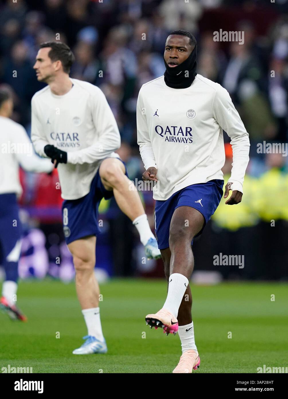 Birmingham, UK. 15th Apr, 2025. William Pacho of Paris St Germain warms ...