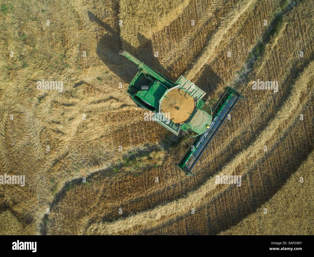 Abstract aerial view tractor harvesting hi-res stock photography and ...