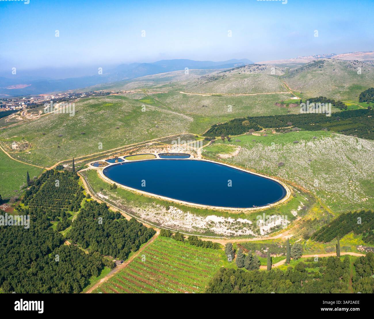 Aerial view of reservoir in a shape of a big foot, Amiad, Northern ...