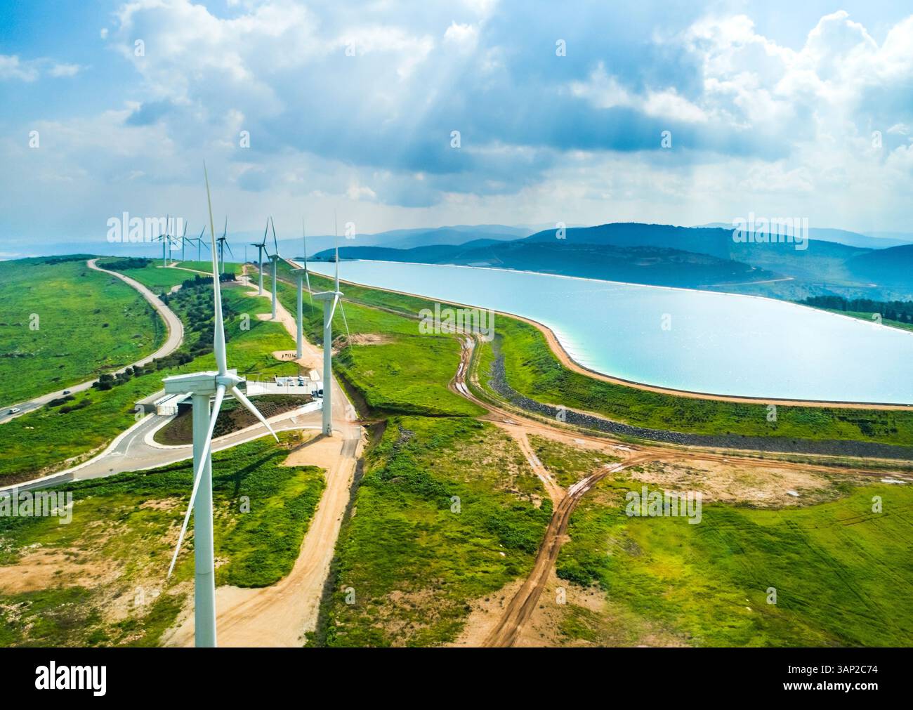 Aerial view of wind turbine and artificial lake, Mount Gilboa, Israel ...