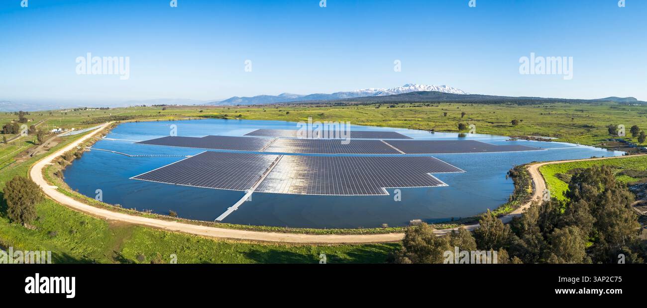 Panoramic aerial view of a water reservoir covered with floating solar ...