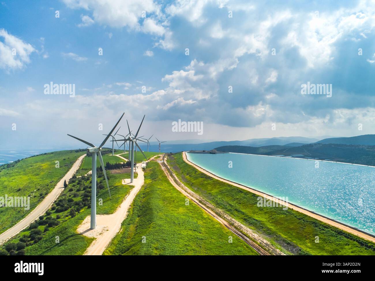 Aerial view of wind turbine and artificial lake, Mount Gilboa, Israel ...