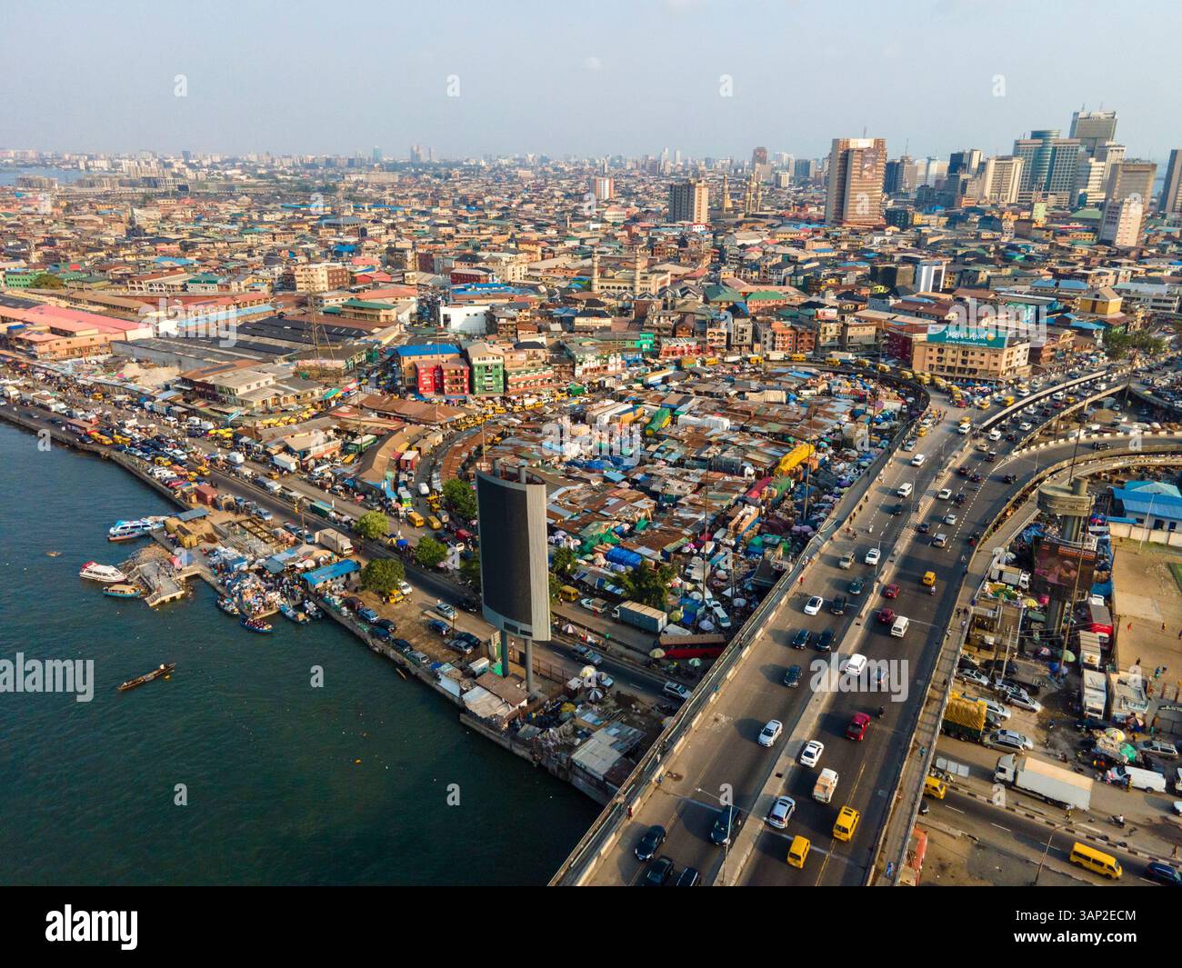 Aerial view of beautiful urban skyline with buildings and bridge over water, Iddo, Lagos ...