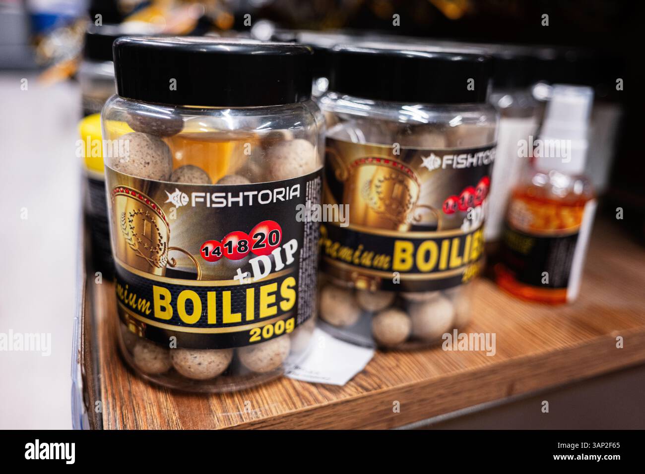Kyiv, Ukraine - April 14, 2025: Closeup view of fishing bait jars with ...