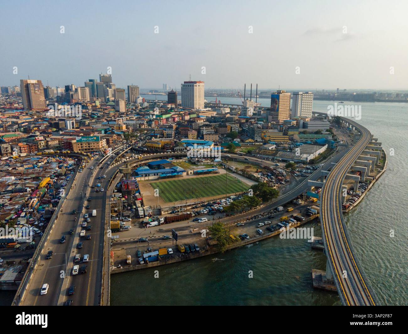 Aerial view of the scenic skyline with the Lekki Ikoyi Link Bridge over water and downtown ...