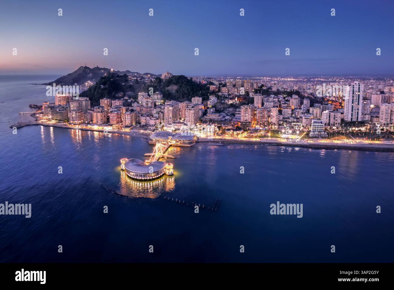 Aerial view of vibrant cityscape with illuminated buildings and ...