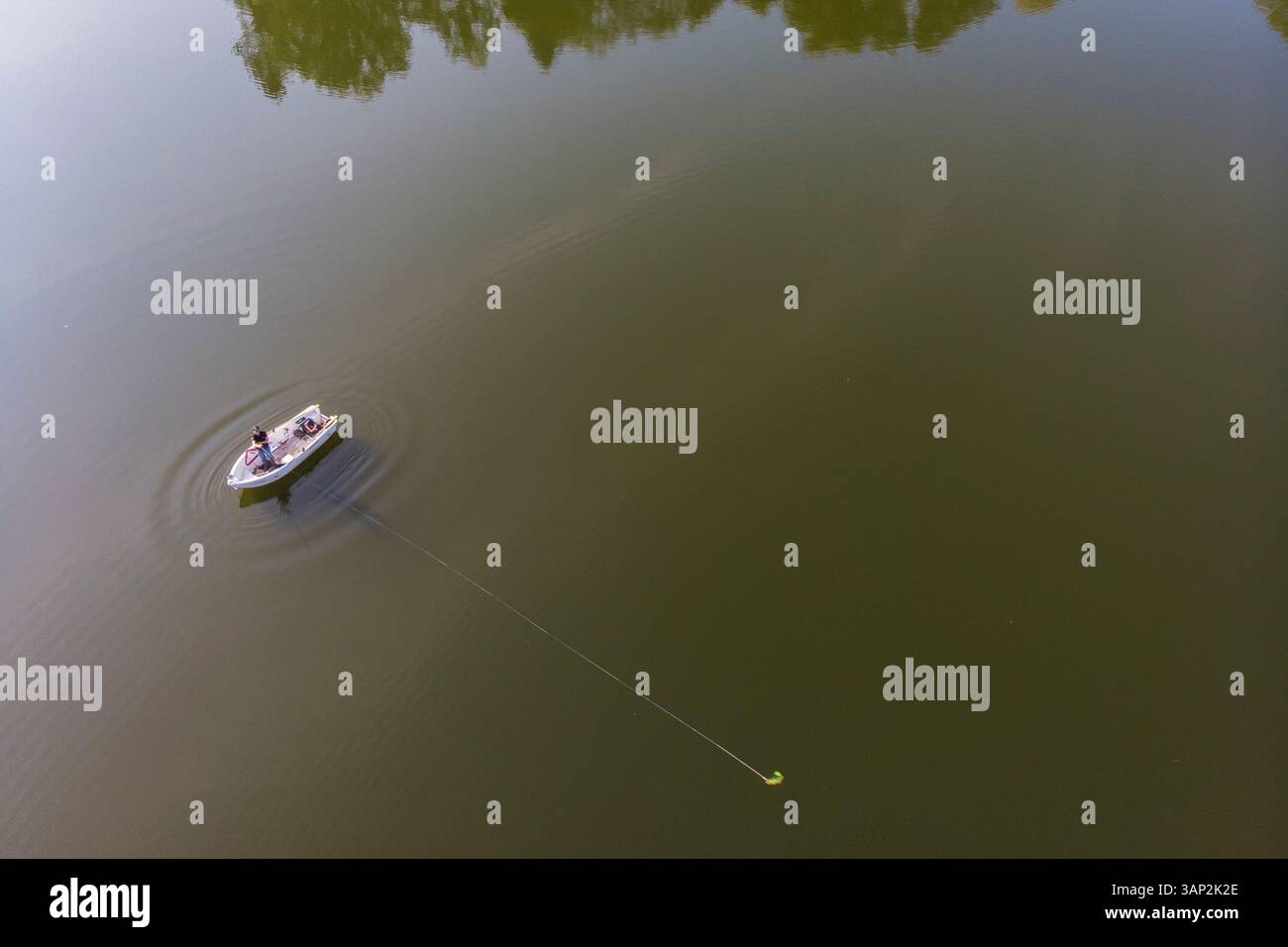 Aerial view of a small boat in Lac de Bret, Puidoux, Switzerland Stock ...