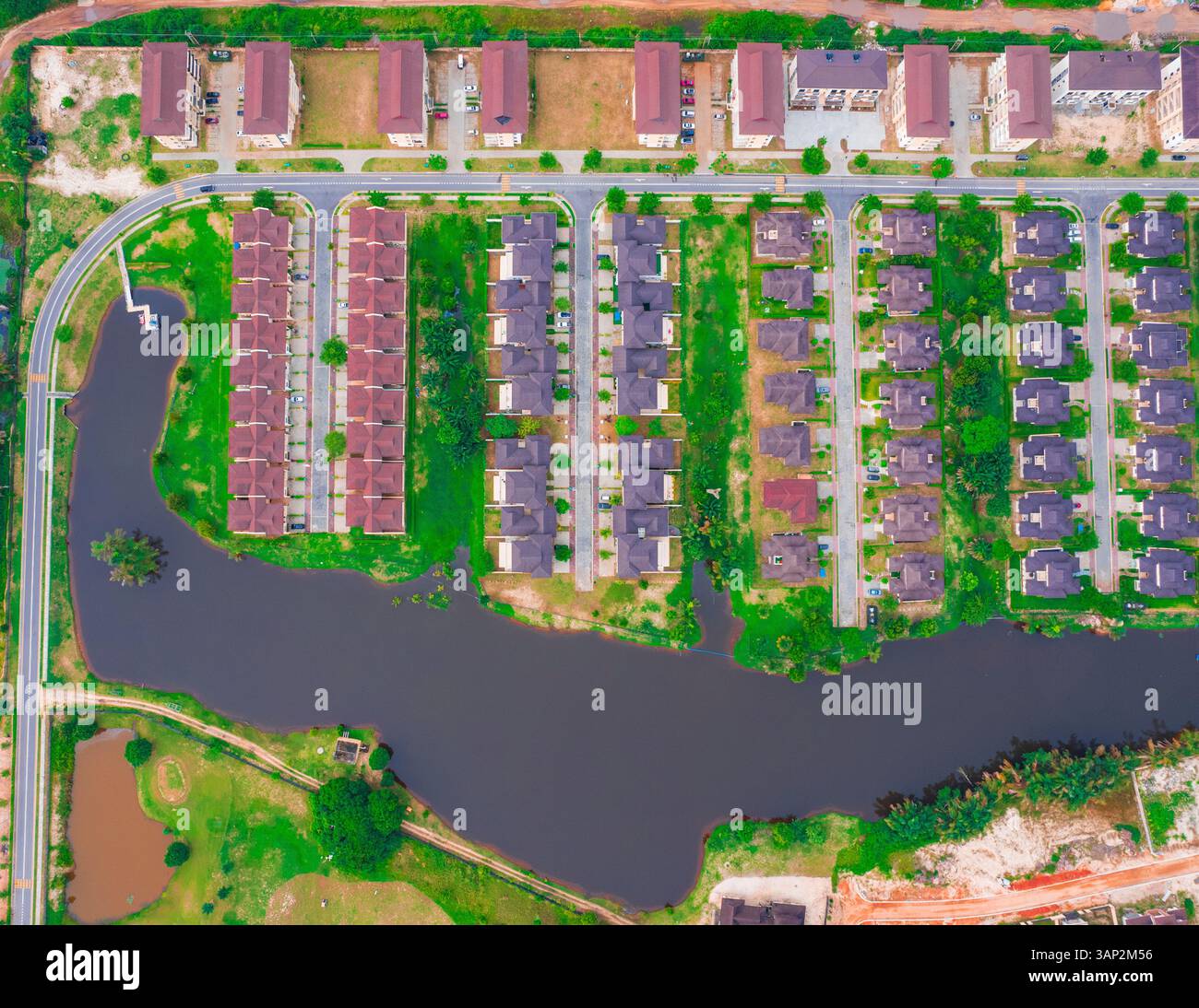 Aerial view of Lakowe Golf Estate with modern homes and a scenic lake ...