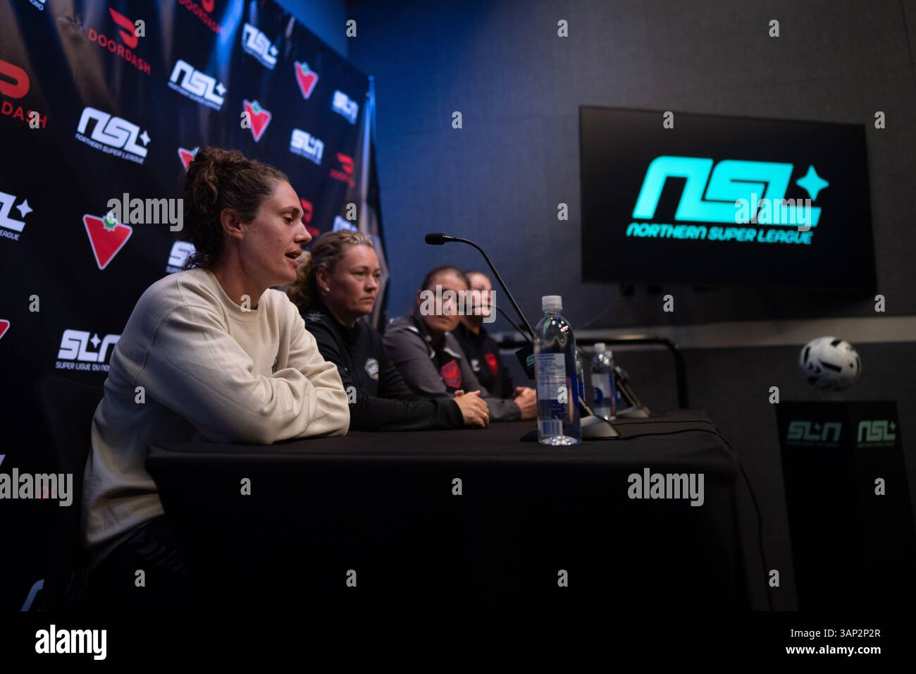 Vancouver Rise's Shannon Woeller, front, speaks along side head coach ...