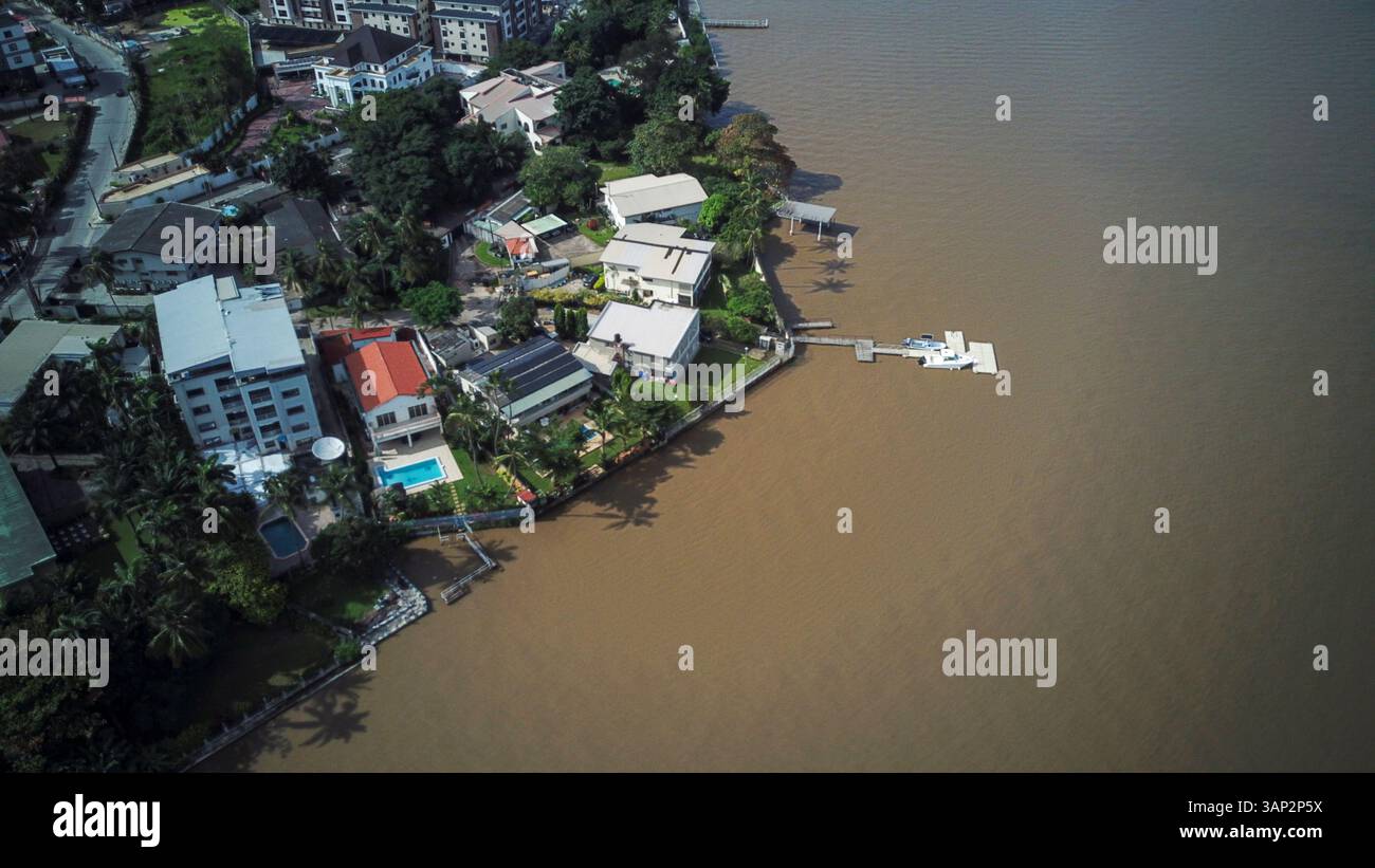Aerial view of vibrant cityscape with modern high-rise buildings and bustling streets near the ...