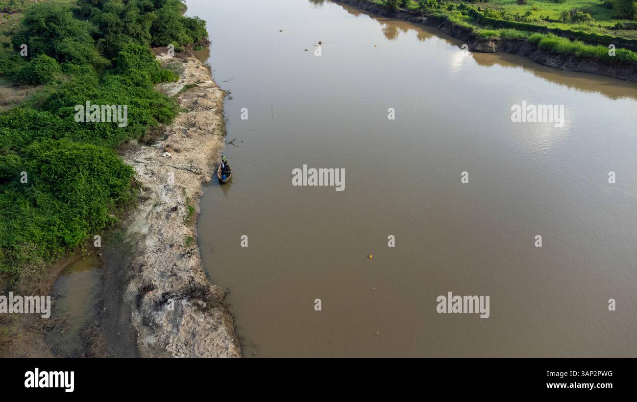 Aerial view of the beautiful Ogun River surrounded by lush greenery and ...