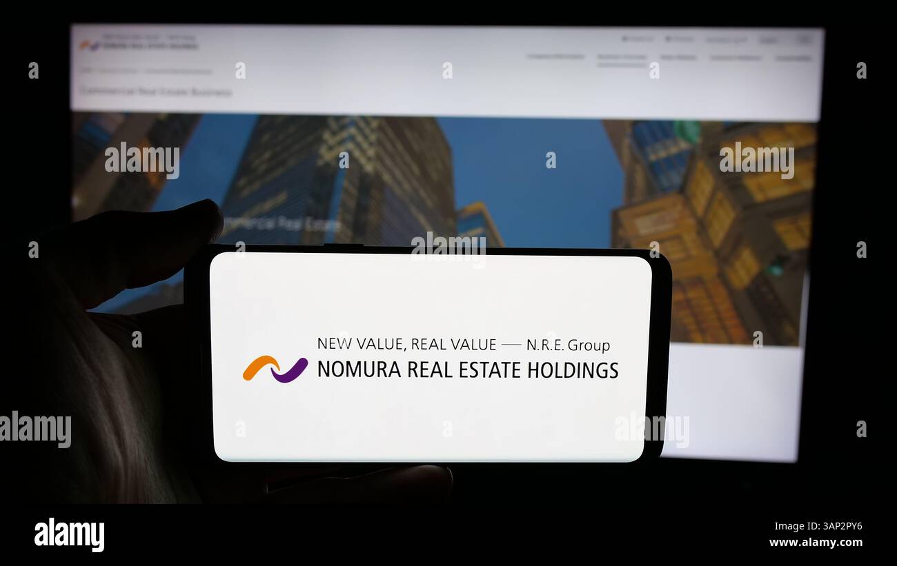 Stuttgart, Germany - 12-05-2024: Person holding cellphone with logo of ...