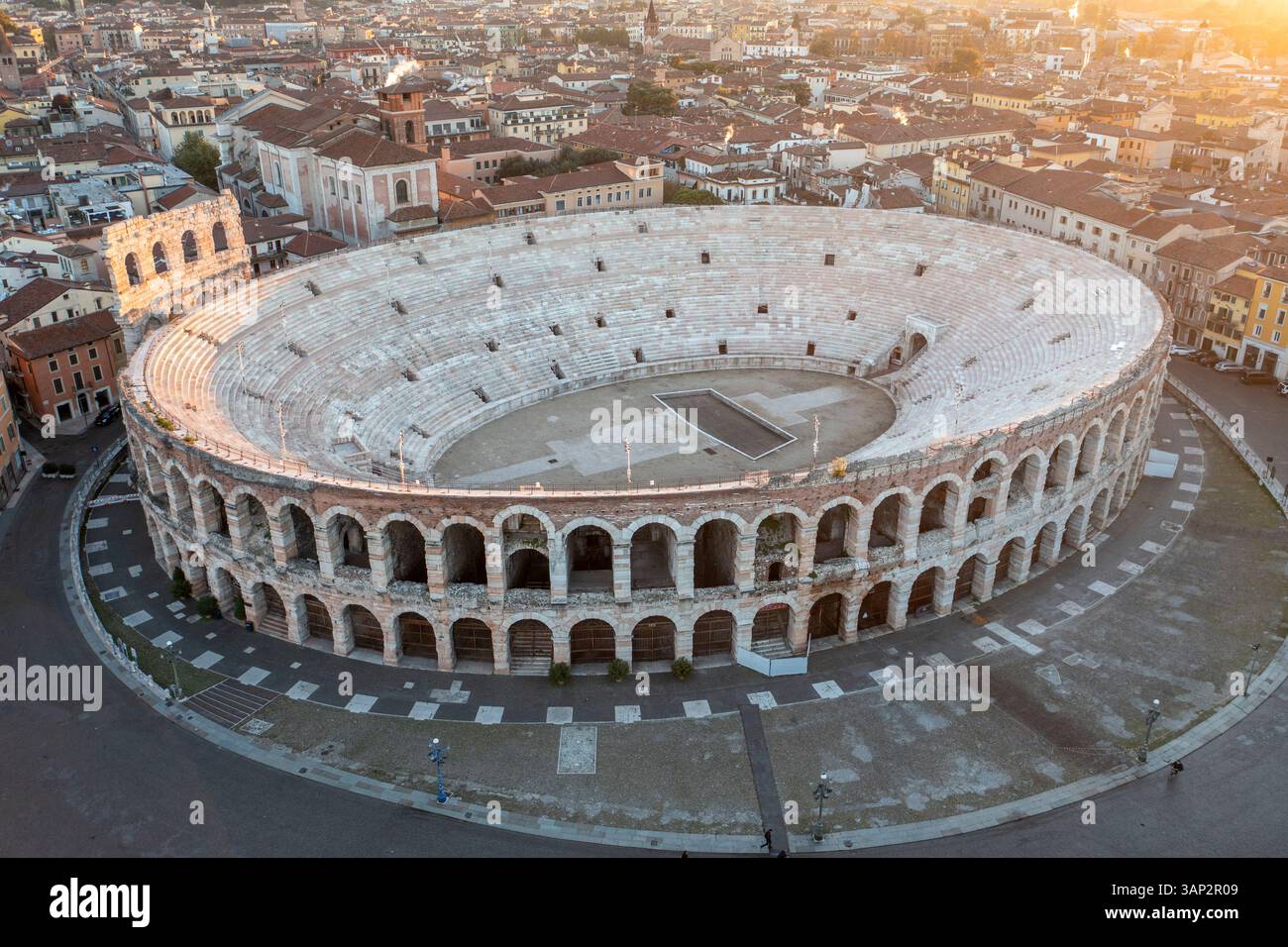 Aerial view of verona arena and historic architecture at sunset, verona ...