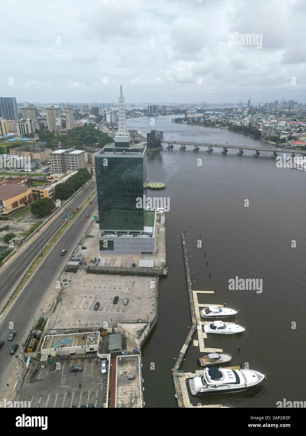 Aerial view of a beautiful urban skyline with skyscrapers, a river, and a bridge, Lagos, Nigeria ...