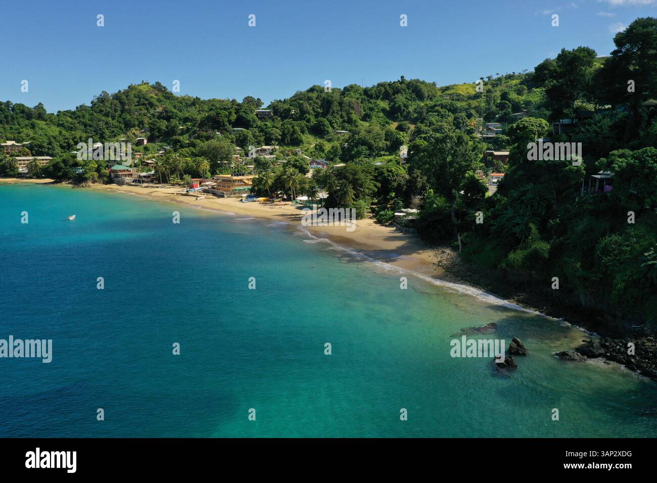 Aerial view of beautiful tropical beach with turquoise ocean and lush ...