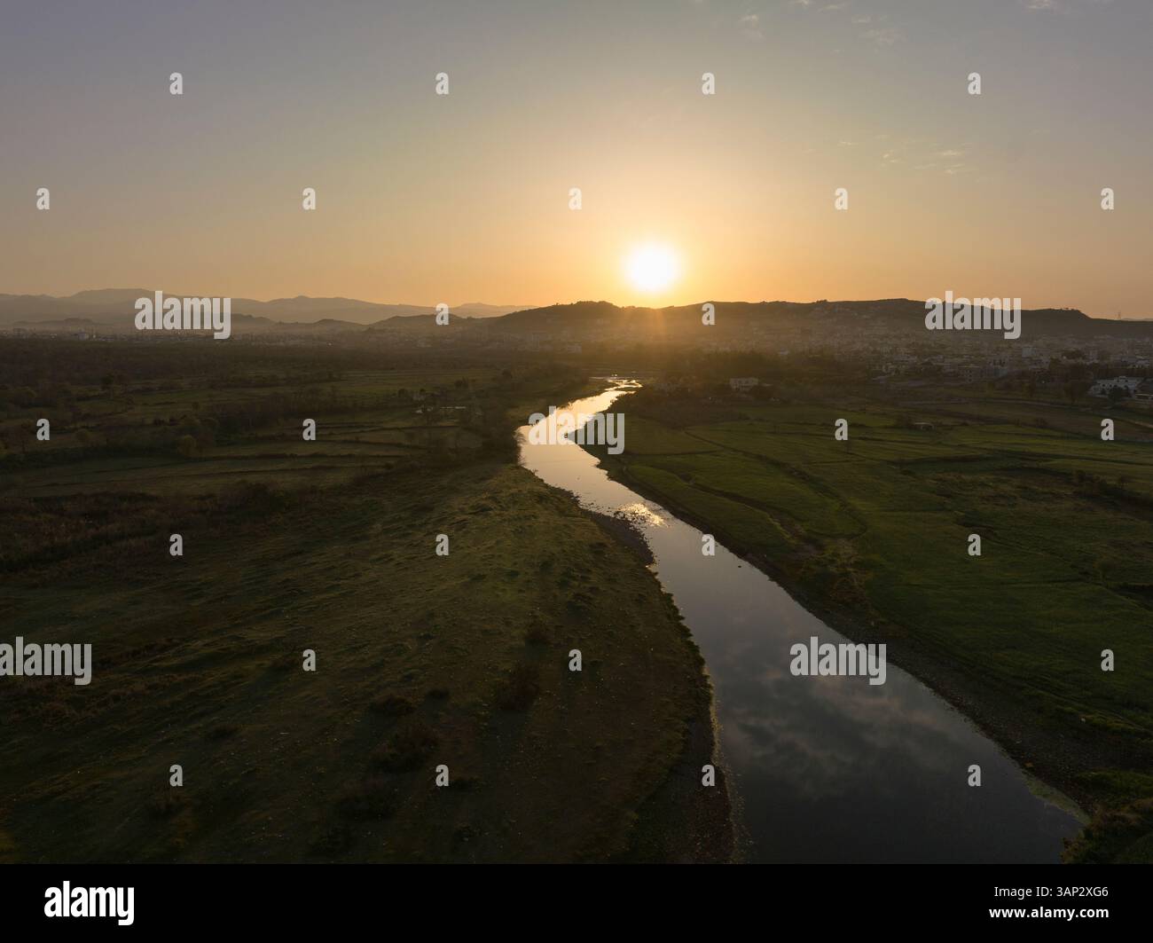 Aerial view of river at sunrise over Bani Gala, in Islamabad, Pakistan ...