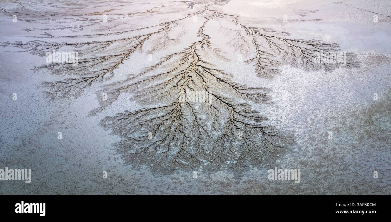 Aerial view of beautiful alluvial fan patterns in a scenic winter ...
