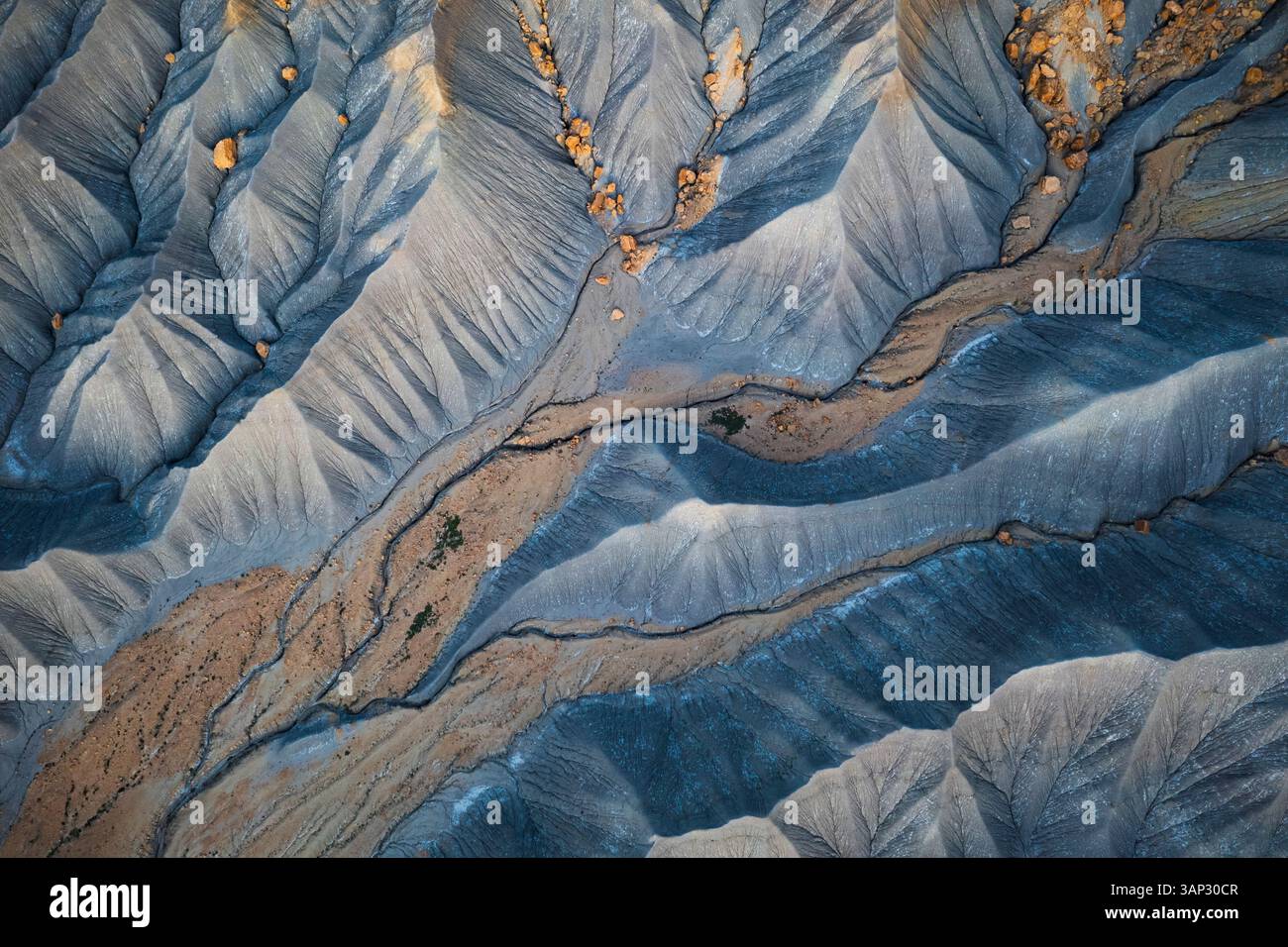Aerial view of abstract aerial badlands with colorful rock formations ...