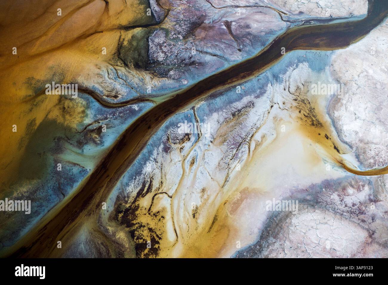 Aerial view of colorful mineral mine with vibrant patterns and textures ...
