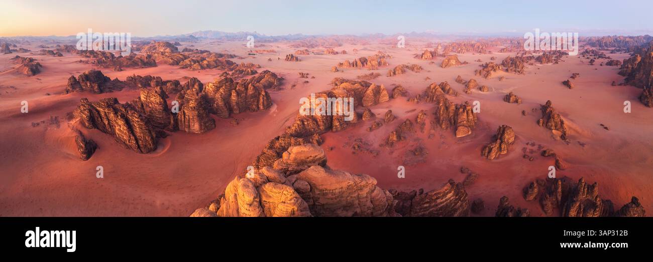Aerial view of sandstone buttes in a serene desert landscape, Tabuk ...