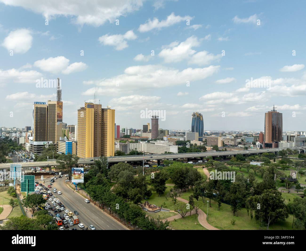 Aerial view of vibrant cityscape with modern skyscrapers and greenery ...