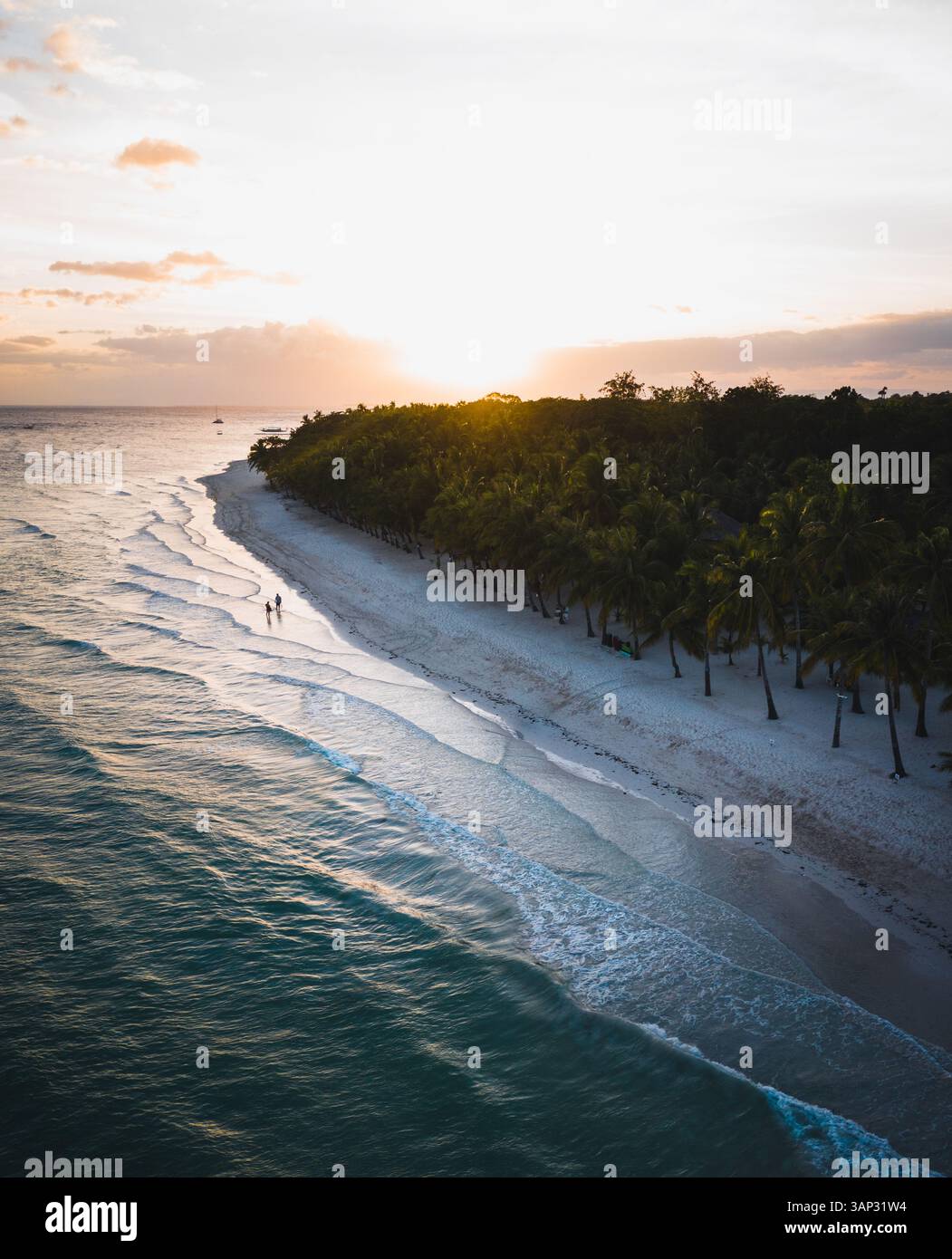 Aerial view of the beach shore at sunset in Bolod, Panglao, Bohol ...