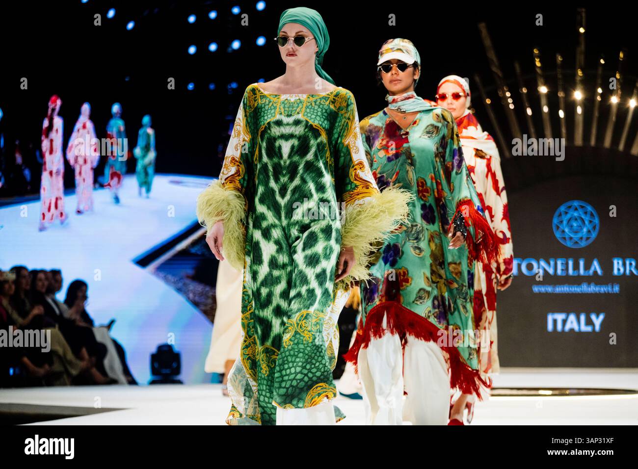 Models from Antonella Bravi walk the runway during the event. Designers ...