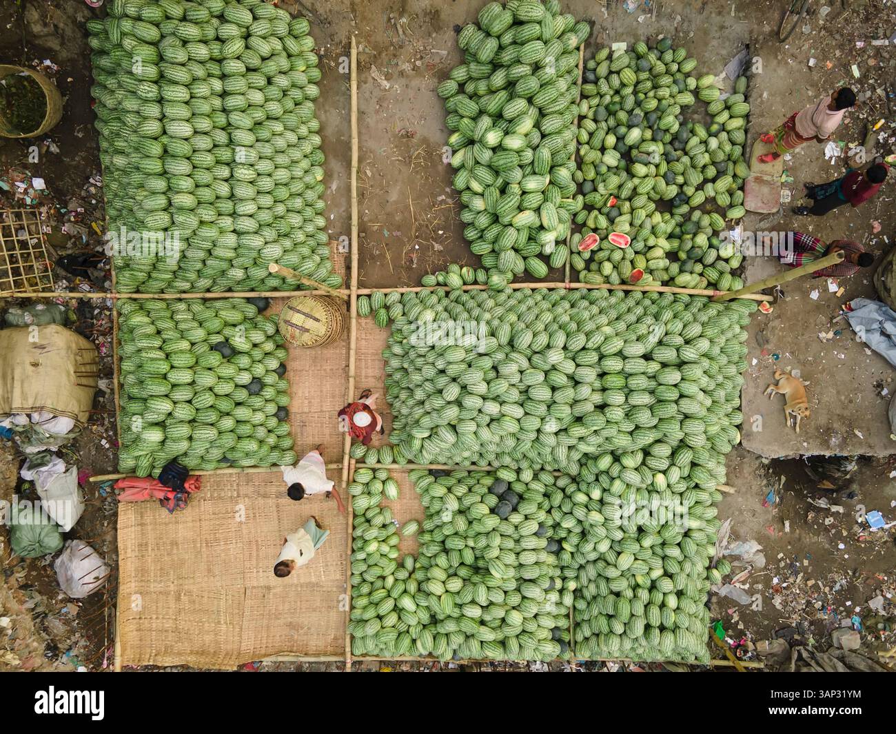 Aerial view of a vibrant street market bustling with people selling ...