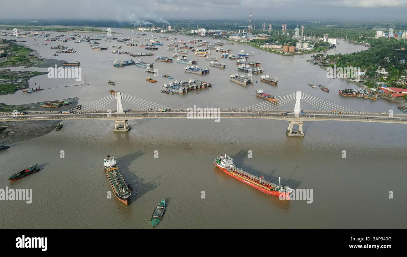 Aerial view of shah amanat bridge over karnafully river with ships ...