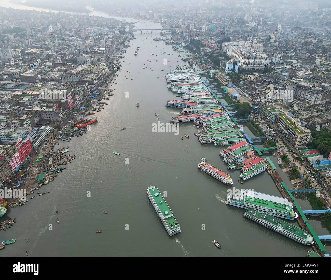 Aerial view of Sadarghat with bustling ships along the Buriganga River ...